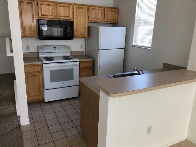 4004 Venetian Bay Dr, Unit 108, Kissimmee, FL 34741 | MLS #O6388 | Compass