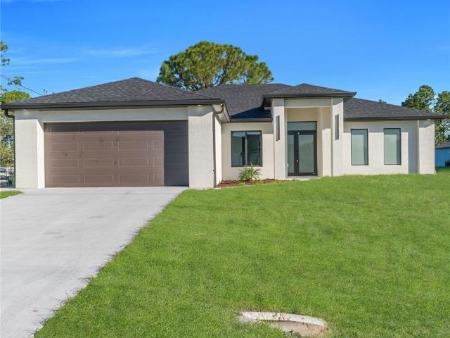4028 26th St SW, Lehigh Acres, FL 33976 | MLS #2026015 | Compass