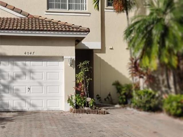 4047 Northwest 92nd Ave, 3 beds, 3 full baths