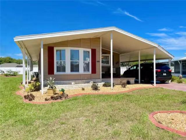 4047 JOYFUL LN, ZEPHYRHILLS, FL 33541 Single Family Residence.