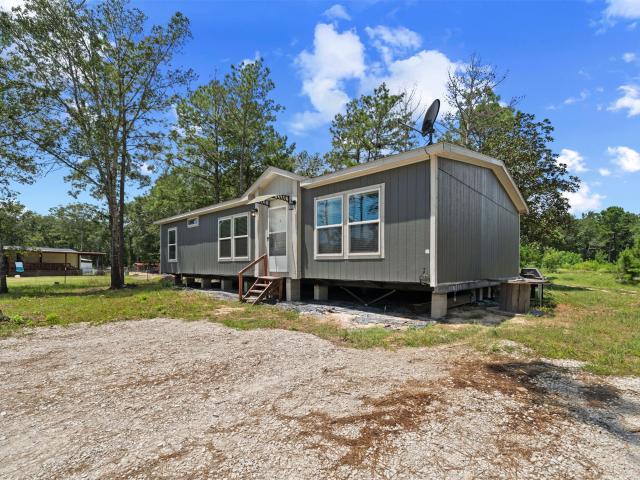 404 County Road 3295, Cleveland, TX 77327 | MLS #15064 | Compass