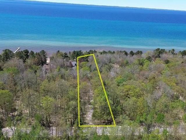 404 Golden Beach Dr, Kewadin, MI 49648