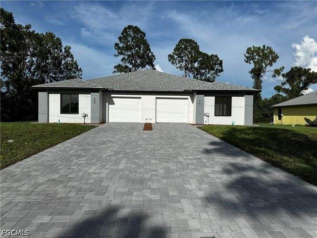 405 407 Chalet Ave S, Lehigh Acres, FL 33974