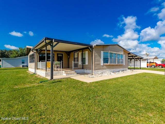 409 Macadamia Dr, Micco, FL 32976