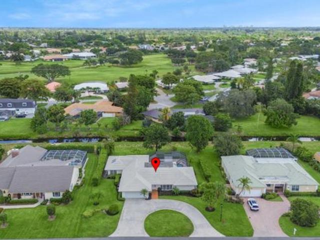 416 Muirfield Dr, Atlantis, FL 33462