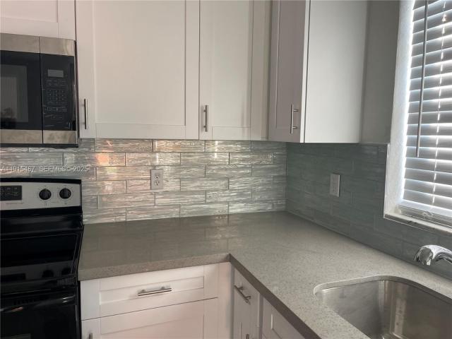 4281 Riverside Dr, Unit 1, Coral Springs, FL 33065 | MLS #A11915 | Compass