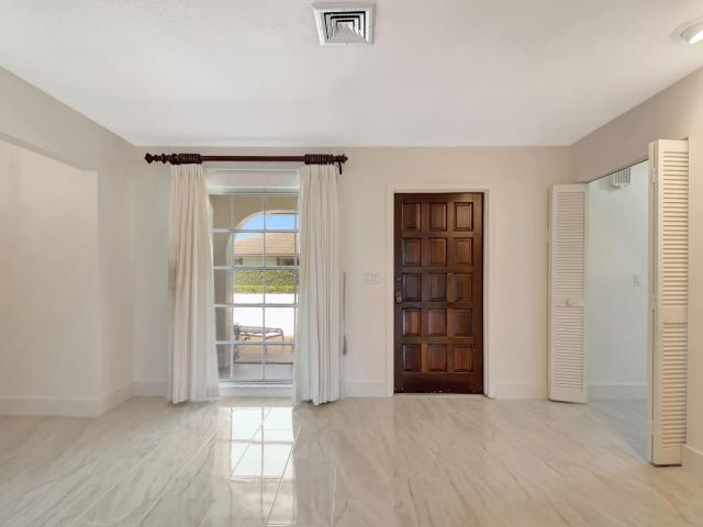 428 Pine Villa Dr, Atlantis, FL 33462 | MLS #R11166 | Compass