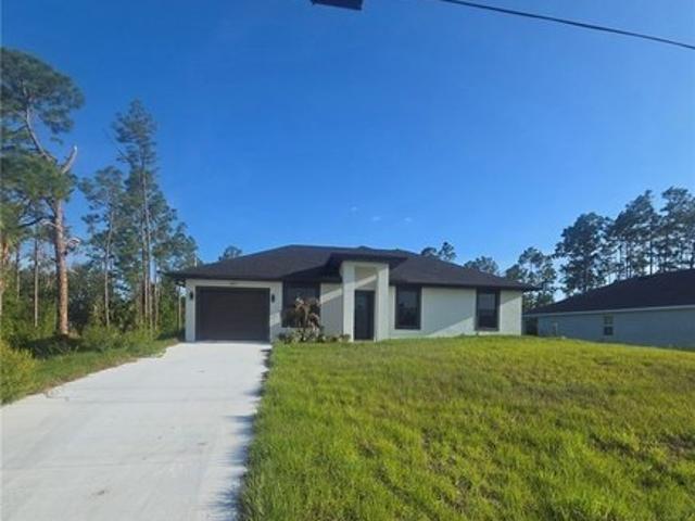 457 Woodman Dr, Lehigh Acres, FL 33972