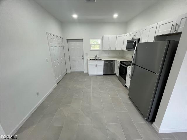 464 Latic Ave S, Lehigh Acres, FL 33974 | MLS #2026014 | Compass