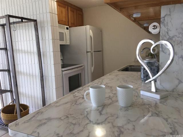 46 283 Kahuhipa St, Unit 1, Kaneohe, HI 96744 | MLS #202607 | Compass