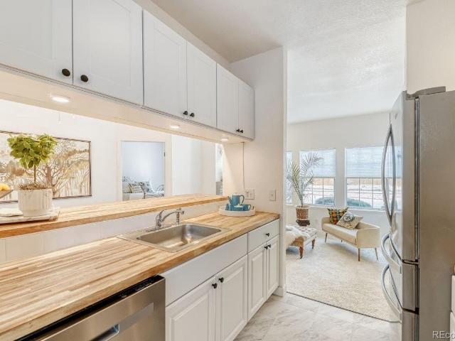 4760 S Wadsworth Blvd, Unit 107, Littleton, CO 80123 | MLS #3720 | Compass