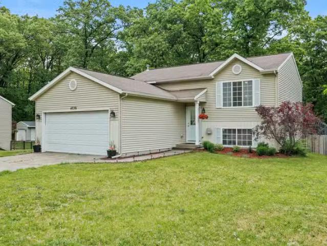 4778 BLUE HERON DR, PIERSON, MI 49339 Single Family Residence.