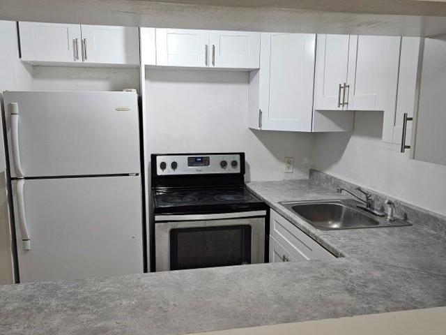 4848 NW 24th Ct, Unit 112, Lauderdale Lakes, FL 33313 | MLS #F10525 | Compass