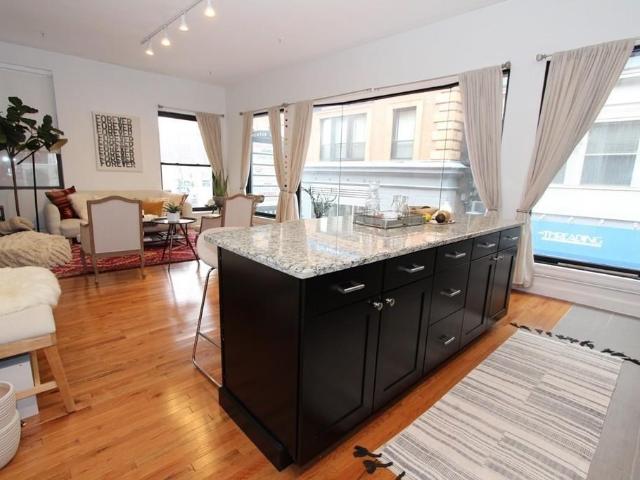 48 50 Winter St, Unit 21, Boston, MA 02111 | MLS #73472 | Compass
