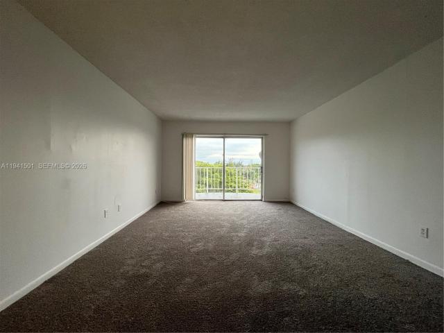 492 NW 165th St, Unit C611, Miami, FL 33169 | MLS #A11941