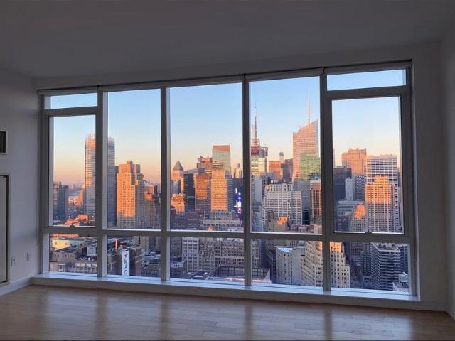 49th Floor Penthouse — 2 Rooms Available Sept 1st