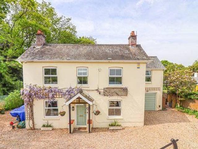 4 bedroom detached house for sale in Burton BH23