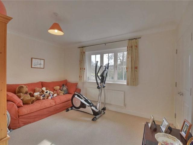 4 bedroom executive house in a small private road, within the popular village of Brimpton, finished throughout to a high standard with quality fixtures and fittings