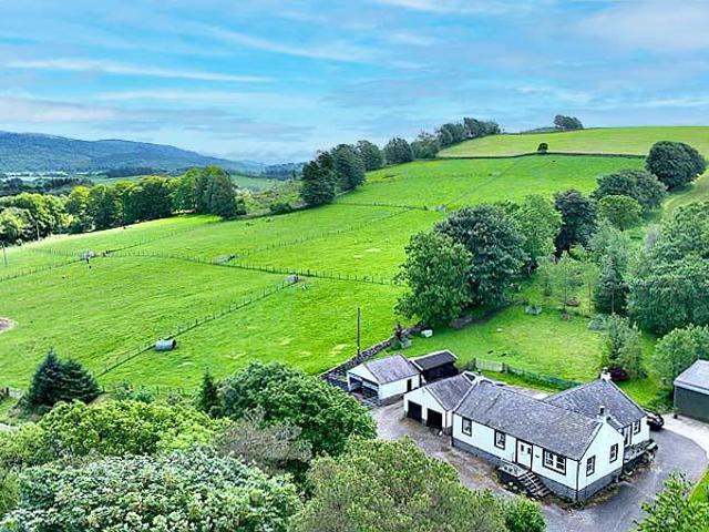 4 bedroom property with land for sale