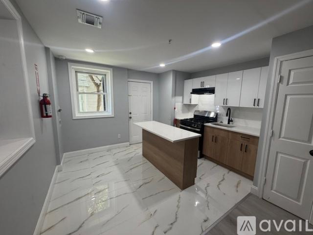 4 BR, 1.5 BA Apartment 96 Eaton Pl, Unit 1L, East Orange, NJ 07017
