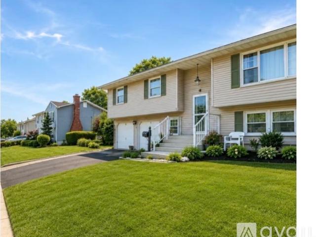 4 BR, 1.5 BA Apartment 9 Chadwell Ct, Neptune City, NJ 07753