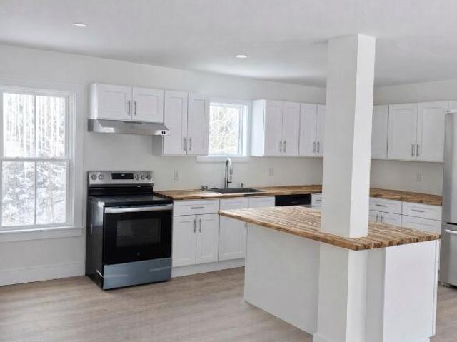 4 Br, 2 bath, Condo 73 Main Street