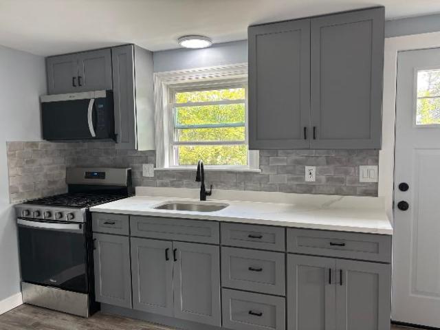 4 Br, 1 bath, Condo 240 Washington St