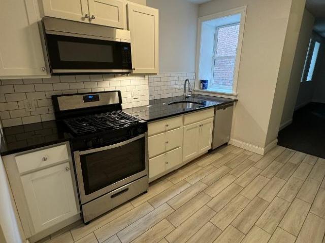 4 Br, 2 bath, Condo 4049 Spruce St