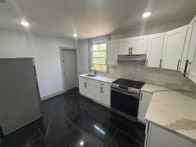 4 Br, 2 bath, Condo 156 Wegman