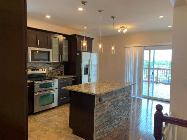 4 Br, 2 bath, Condo 257 Proctor Ave