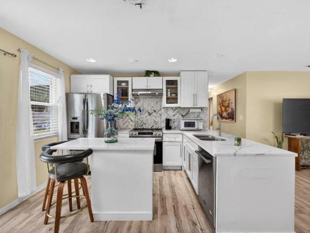 4 Br, 2 bath, Single Family 140 W 31st Court
