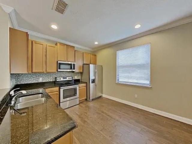 4 Br, 2 bath, Single Family 1414 Canopy Oaks Dr