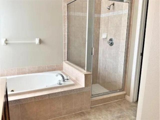 4 Br, 2 bath, Single Family 15564 Lake Bella Vista Dr