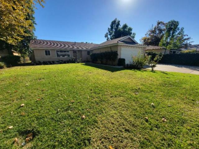 4 Br, 2 bath, Single Family 13550 Leadwell St
