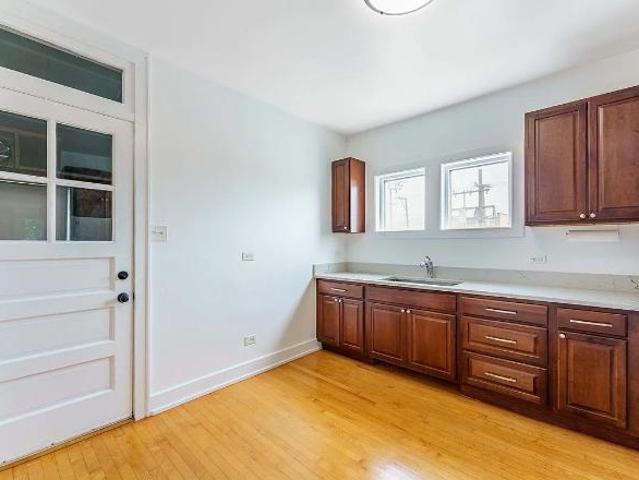 4 Br, 2 bath, Single Family 6042 W Bryn Mawr Ave
