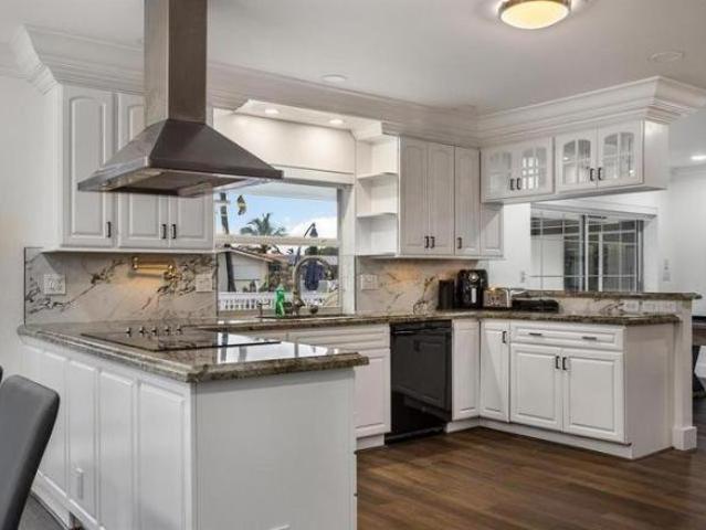 4 Br, 3 bath, Single Family 1419 NE 57th Street