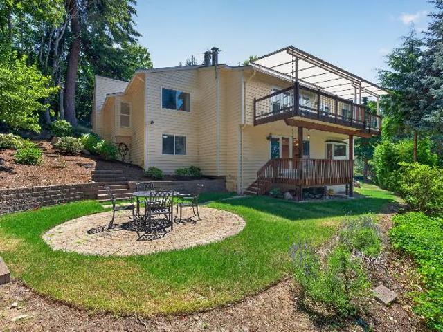 4 Br, 3 bath, Single Family 15248 SE 49th St