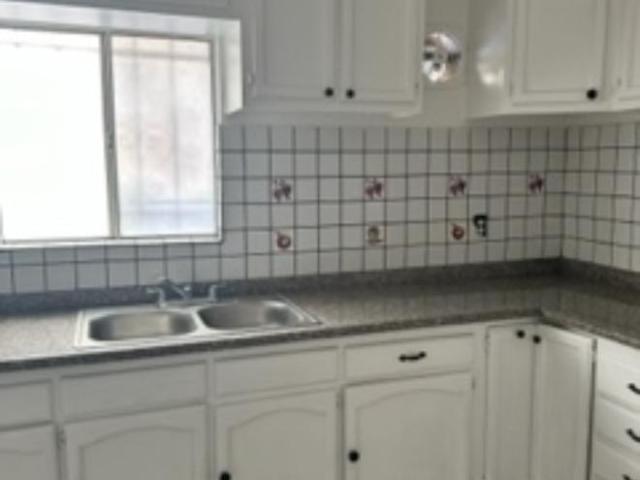 4 Br, 3 bath, Single Family 1557 W 29th Street