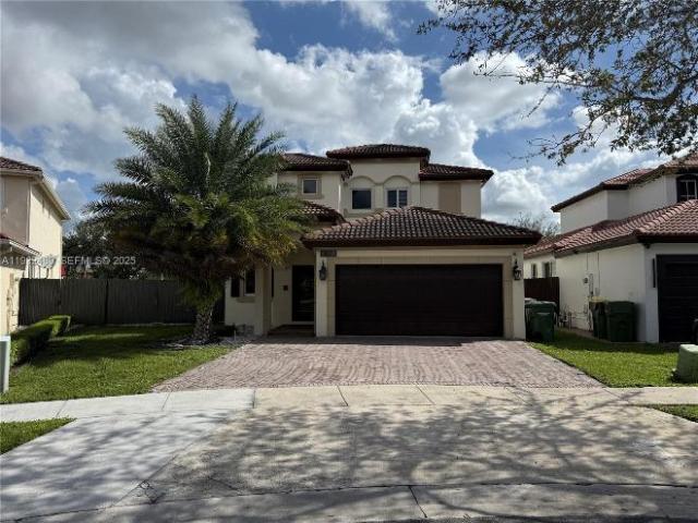 4 Br, 3 bath, Single Family 107 SE 22nd Ter