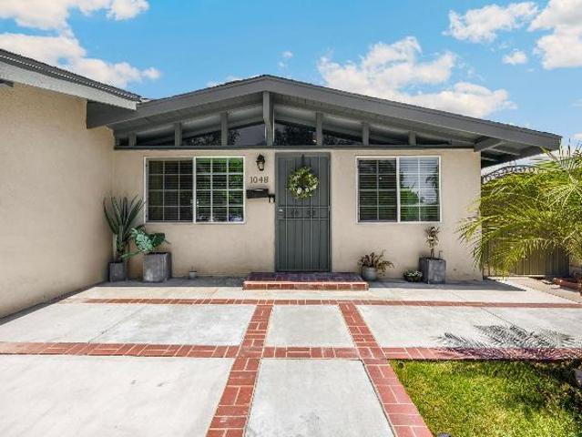 4 Br, 3 bath, Single Family 1048 N Hermosa Dr