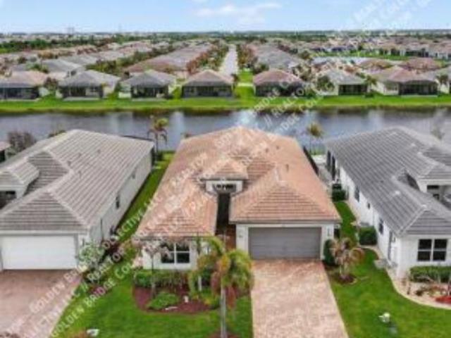 4 Br, 3 bath, Single Family 11765 SW Poseidon Way