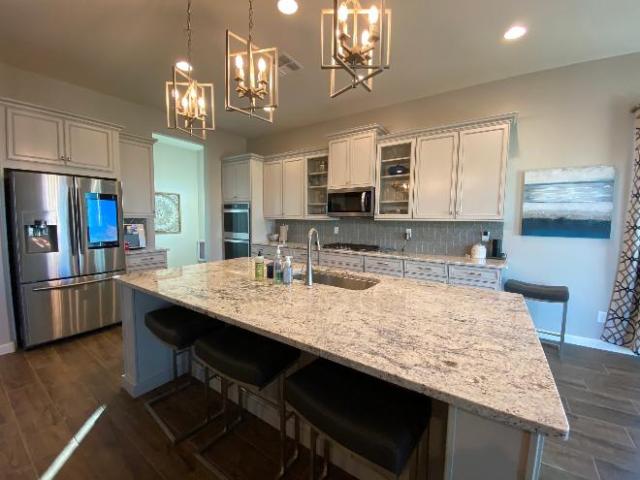 4 Br, 3 bath, Single Family 11958 W Rocky Cove Dr