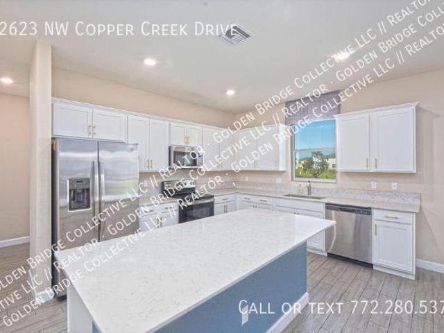 4 Br, 3 bath, Single Family 12623 NW Copper Creek Drive