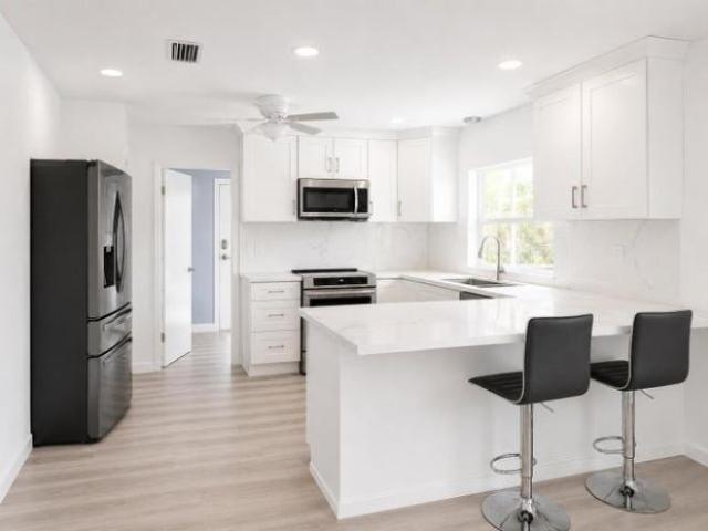 4 Br, 3 bath, Single Family 1301 SW 8th Street