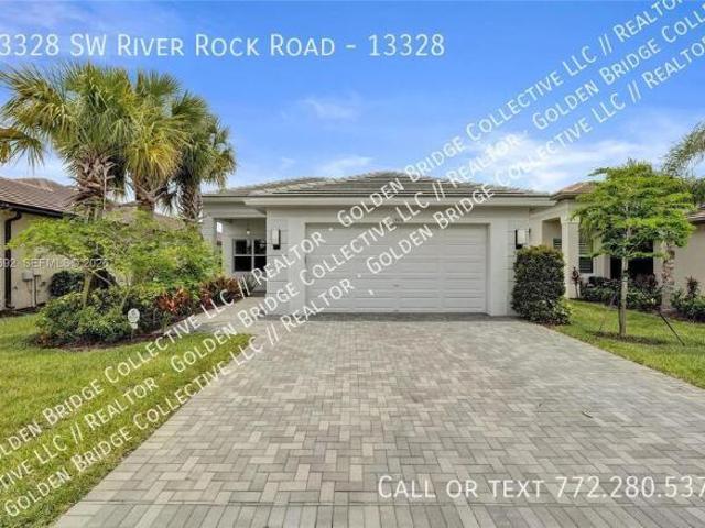 4 Br, 3 bath, Single Family 13328 SW River Rock Road