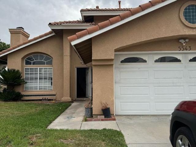 4 Br, 3 bath, Single Family 5543 N Magnolia Dr