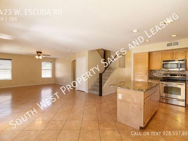 4 Br, 3 bath, Single Family 6423 W Escuda Rd