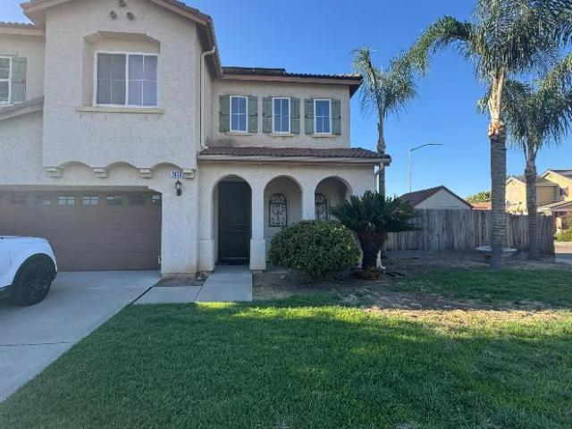 4 Br, 3 bath, Single Family 7474 E Redlands Ave