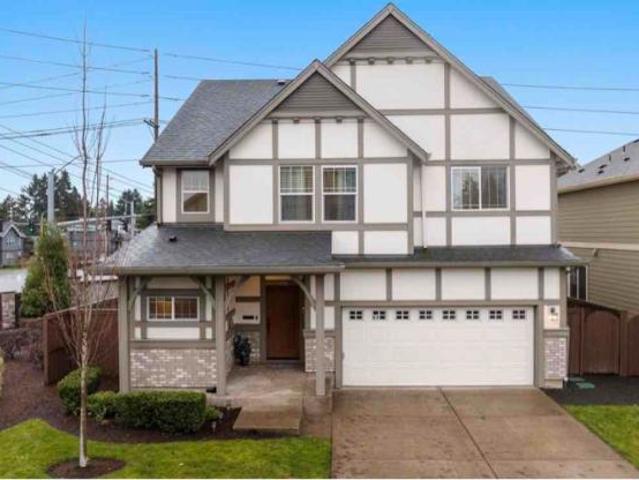 4 Br, 3 bath, Single Family 7696 NE Prefontaine St