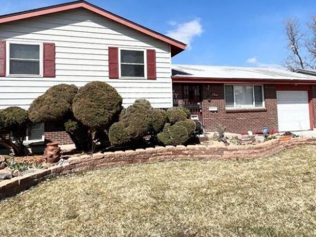 4 Br, 3 bath, Single Family 7051 E Arkansas Ave